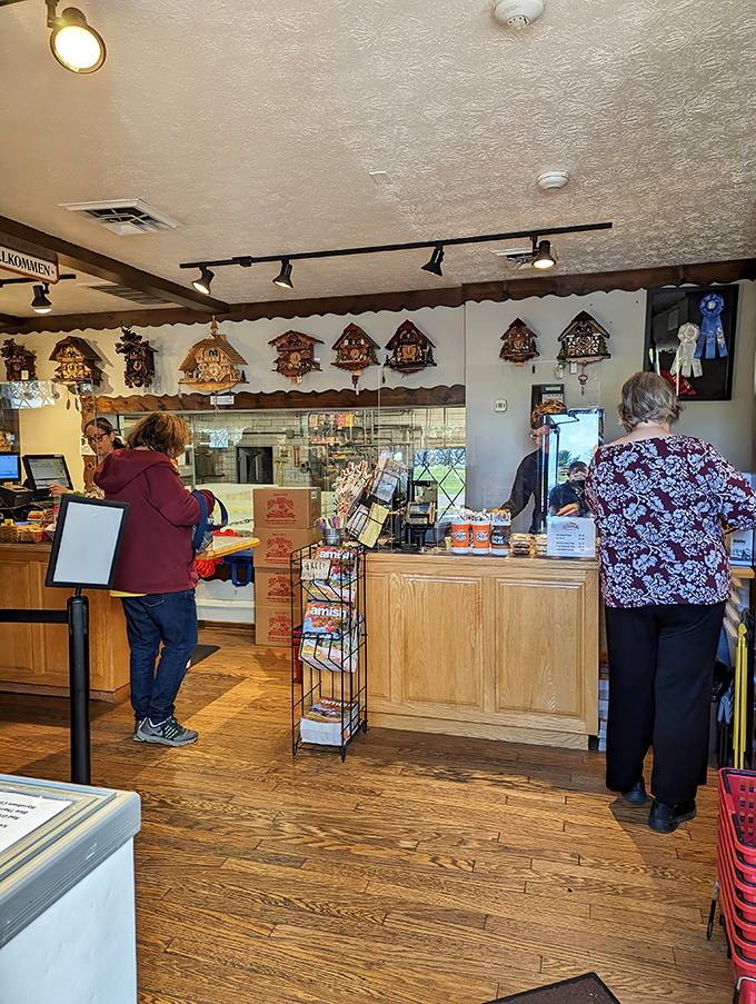 The counter where cheese dreams come true. Notice the cuckoo clocks standing guard over the dairy delights below.