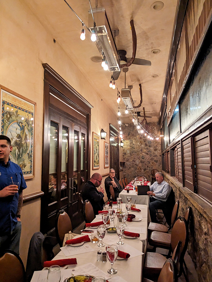 The narrow dining alcove offers an intimate experience—perfect for those who take their meat-eating seriously. String lights add a touch of magic.