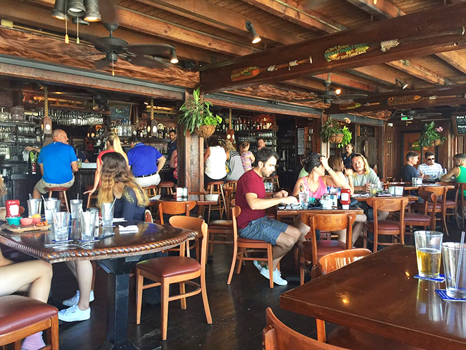 The happiest kind of Florida traffic jam—locals and visitors gathering where good food meets great company under rustic rafters.