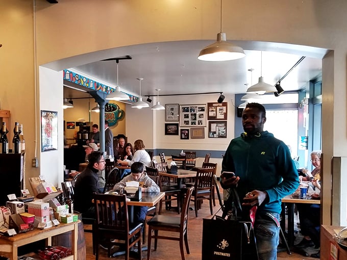 A bustling dining room where strangers become friends united by the universal language of "mmmmm" and "you've got to try this."