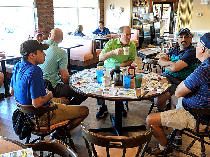 The morning regulars' table&mdash;where world problems are solved daily between coffee refills and hash brown debates.