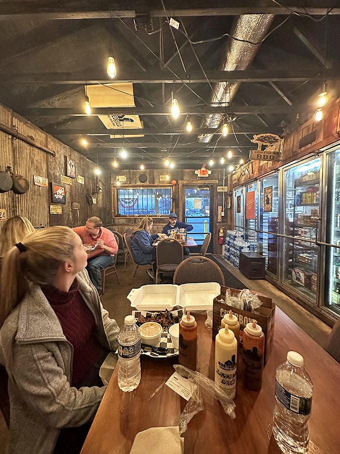 Fellow pilgrims on the barbecue journey, proving that happiness is simply a full plate and the anticipation of that first bite.