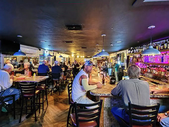 Where everybody knows your name—or will by your second visit. The bar's colorful lighting creates an atmosphere that's both welcoming and slightly magical.