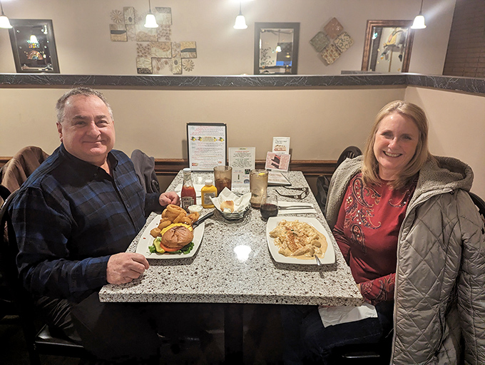 Happy diners caught mid-enjoyment – the universal expression of "I made the right choice coming here today" captured in perfect stillness.