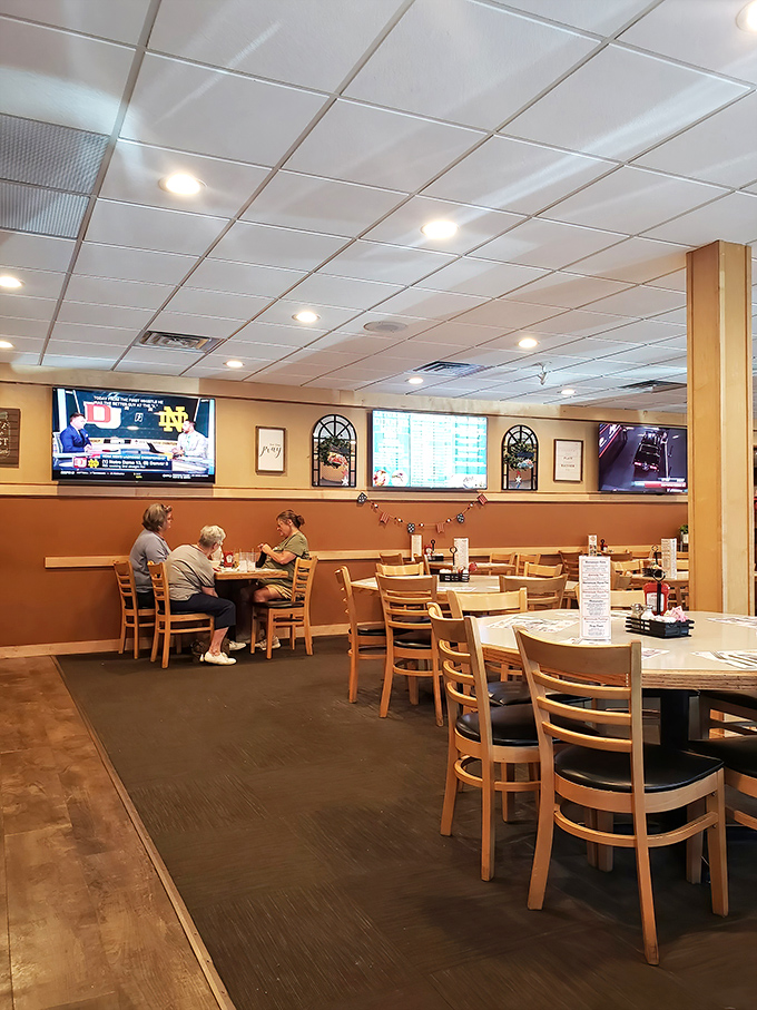More screens than a sports bar, but the real entertainment is watching your breakfast sizzle on the grill.