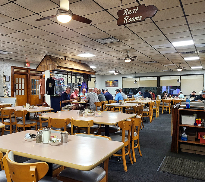 The breakfast rush in full swing, where strangers become temporary family over shared love of pancakes.