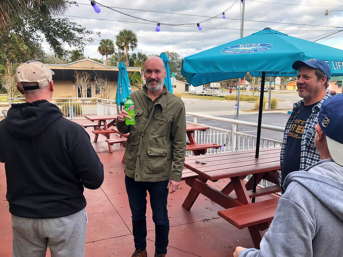 The outdoor patio at Uncle Chicken's – where strangers become friends over shared plates and Florida sunshine.