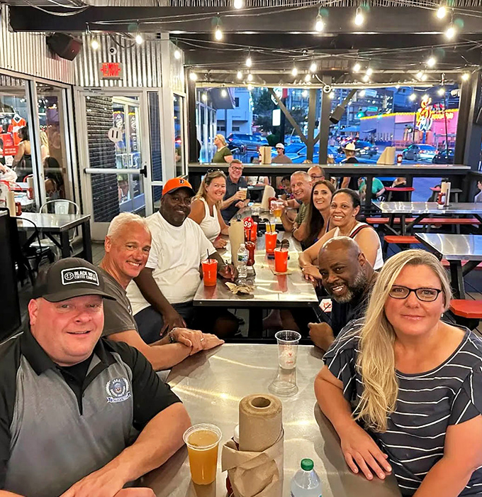 The true measure of a great restaurant? Tables full of happy diners sharing stories, laughter, and occasional tears (from the "Damn Hot!!" level).