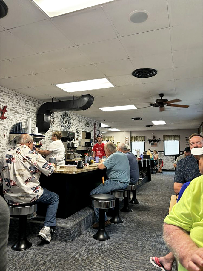 The counter seating&mdash;where solo diners become regulars and regulars become family. More friendships have started here than at most social clubs.