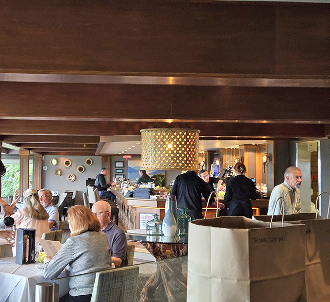 The dining room buzzes with the universal language of "mmm," where strangers become united in the pursuit of exceptional eating.