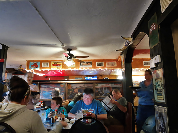 Where locals gather to debate sports, politics, and whether medium-rare truly is the only acceptable way to order steak. Family dinners unfold amid comfortable chaos.