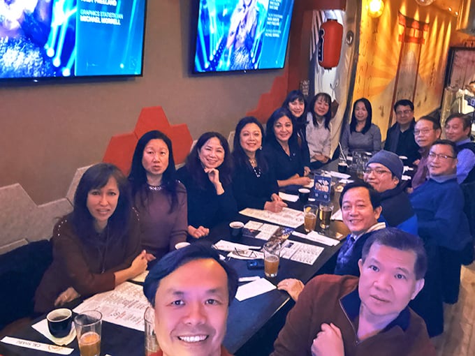 Communal dining at its finest—where strangers become friends over bubbling pots and shared cooking tips.