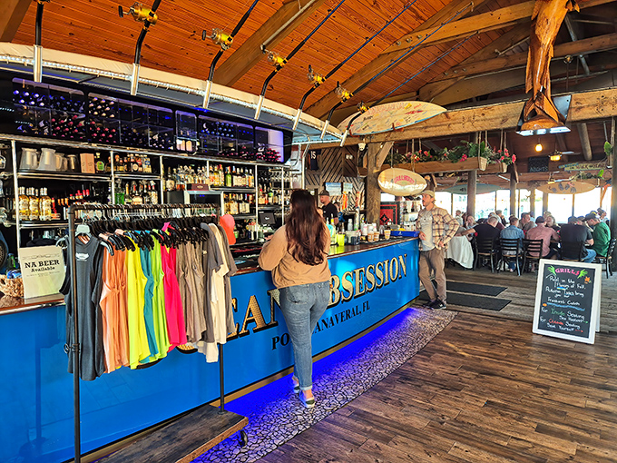 The outdoor bar—where strangers become friends and "I'll just have one" becomes a pleasant afternoon. Note the cruise ship photobombing in the background.