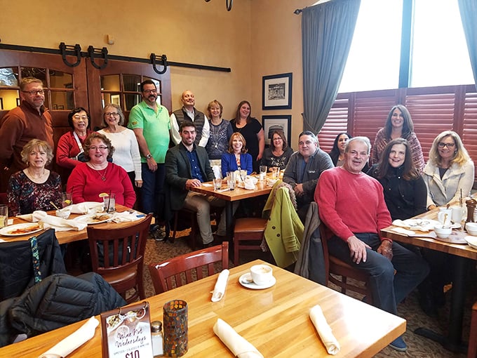A gathering of happy diners proving that Stancato's isn't just a restaurant&mdash;it's where community happens, one forkful of pasta at a time.