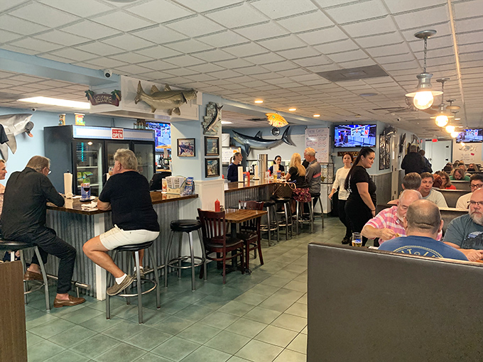 Locals and visitors alike gather at the counter, united by the universal language of "Oh my God, you have to try this."