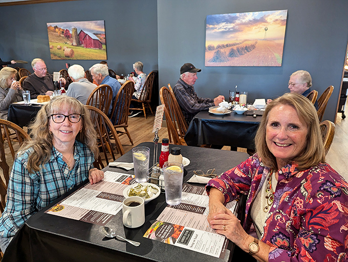 Where rural artwork meets hearty appetites. The paintings aren't just decoration&mdash;they're windows into the world that produces your meal.