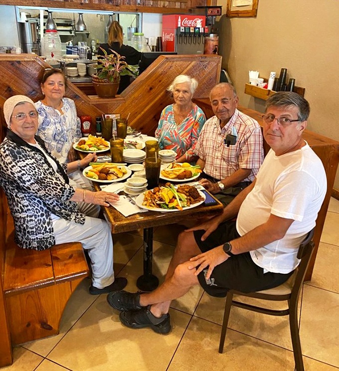 The true measure of a great restaurant: tables filled with happy diners sharing stories over plates that will soon be spotless.