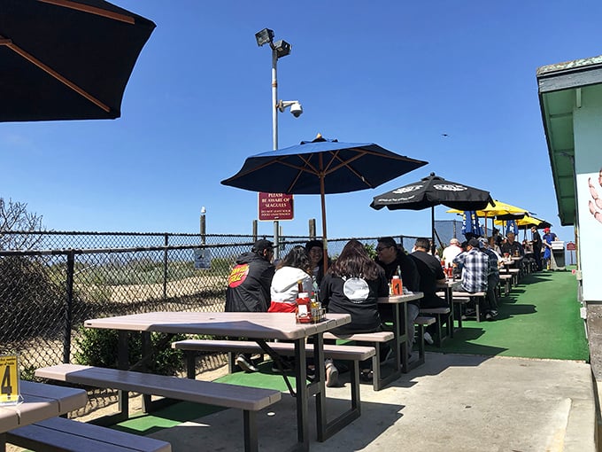 The outdoor dining area offers fresh air and sunshine with your seafood. These diners know the secret to happiness is good food with a view.