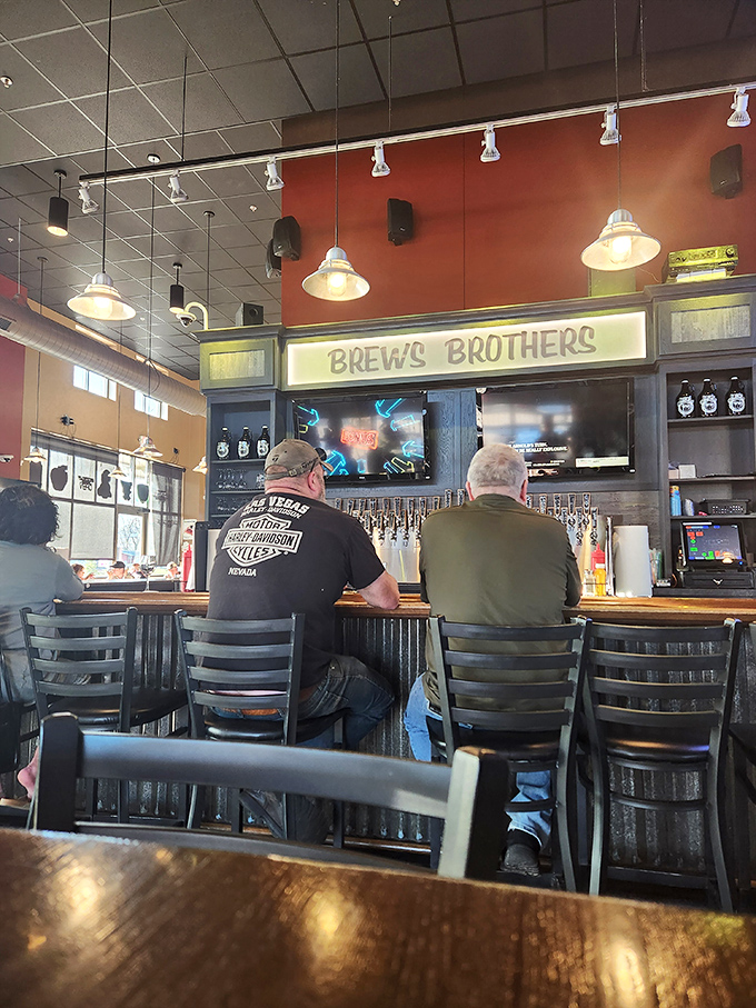 The bar at Brews Brothers&mdash;where strangers become friends over pints and patties. A true Wisconsin social hub.