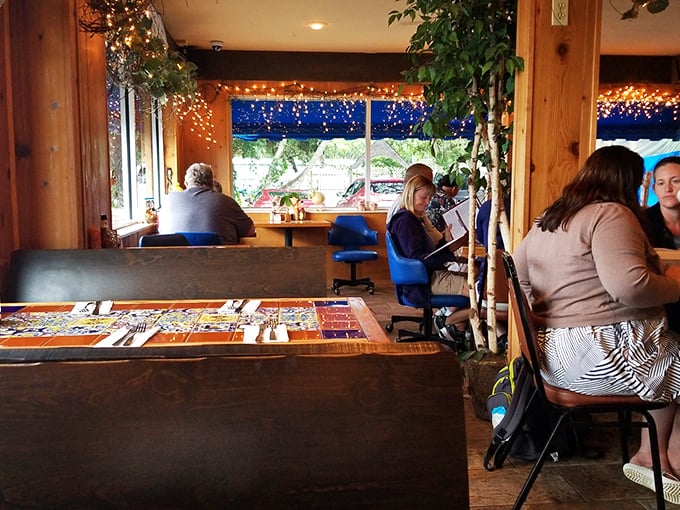 Happy diners enjoying the kind of meal that transforms strangers into friends and regulars into family.