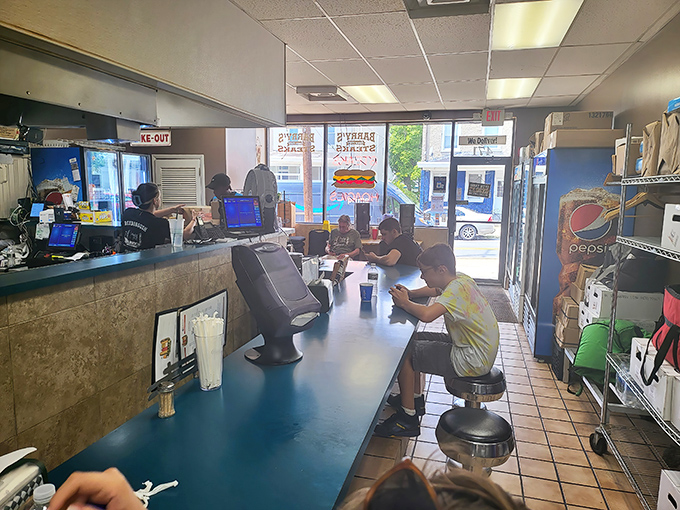 The counter at Barry's&mdash;where strangers become friends united by the universal language of "Whiz wit" and the pursuit of sandwich perfection.