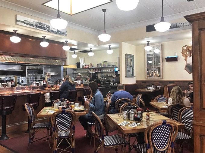The dining room hums with the universal language of "mmm." Notice how nobody's looking at their phones? That's the power of food worth paying attention to.