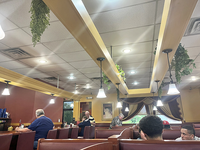 Where strangers become temporary neighbors, sharing nothing but space and the universal language of "pass the ketchup, please."