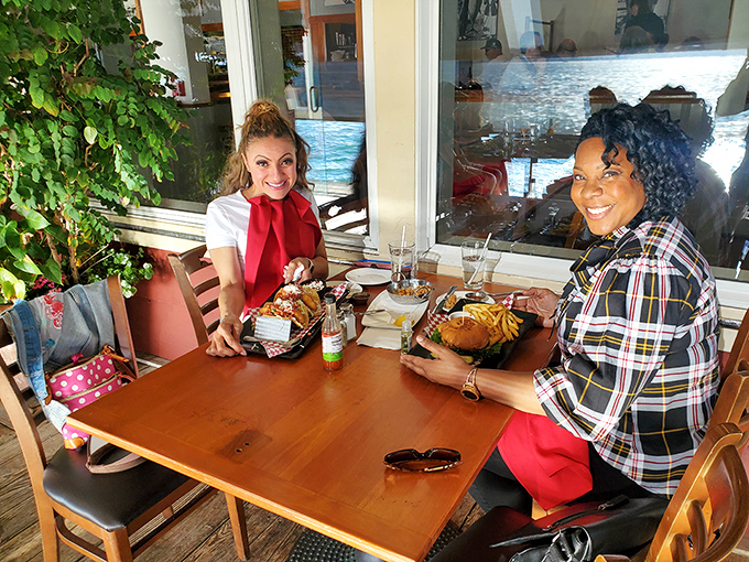 Two happy diners enjoying the fruits of the sea &ndash; their expressions say what words can't: "Why did we wait so long to come here?"