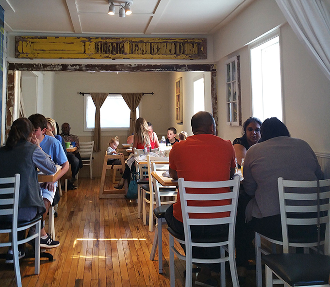 The universal language of brunch: strangers united by the pursuit of perfect pancakes and bottomless coffee.