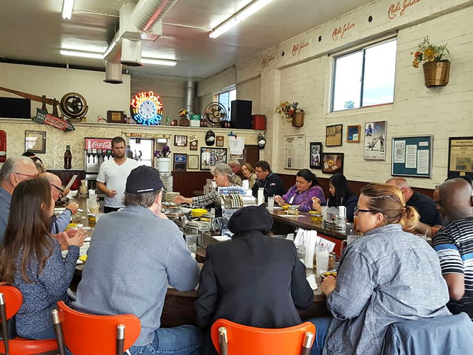 The counter isn't just full&mdash;it's a community of strangers united by the universal language of "this chili is worth the wait."