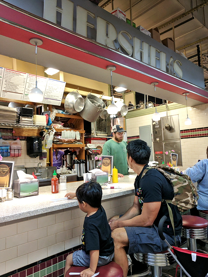 The iconic Hershel's sign welcomes hungry pilgrims to the promised land of pastrami. A beacon of hope for the sandwich-deprived.