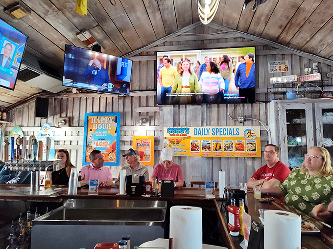 The bar where strangers become friends and friends become family, all united by the universal language of sports on TV and cold drinks.