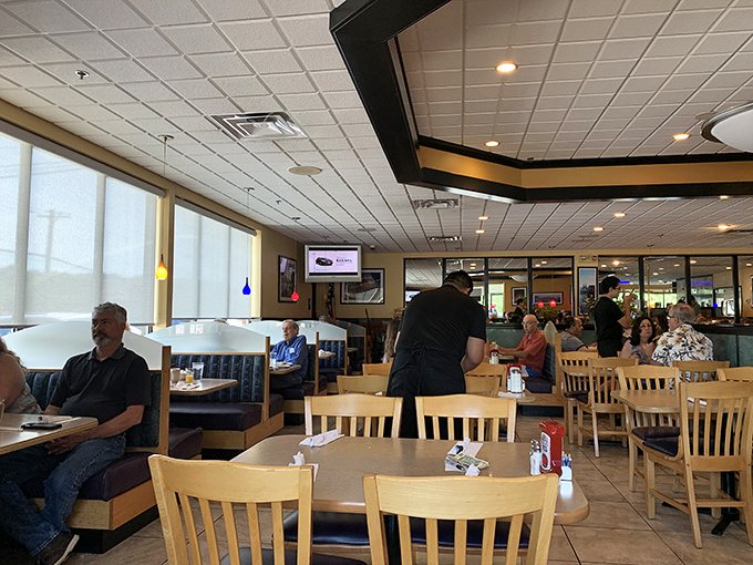 Tables filled with diners engaged in that universal breakfast ritual: deciding whether to be virtuous or indulgent. Spoiler alert: indulgence usually wins.