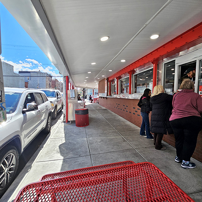 The pilgrimage in progress. These aren't just customers&mdash;they're participants in a ritual that's defined Philadelphia for generations.