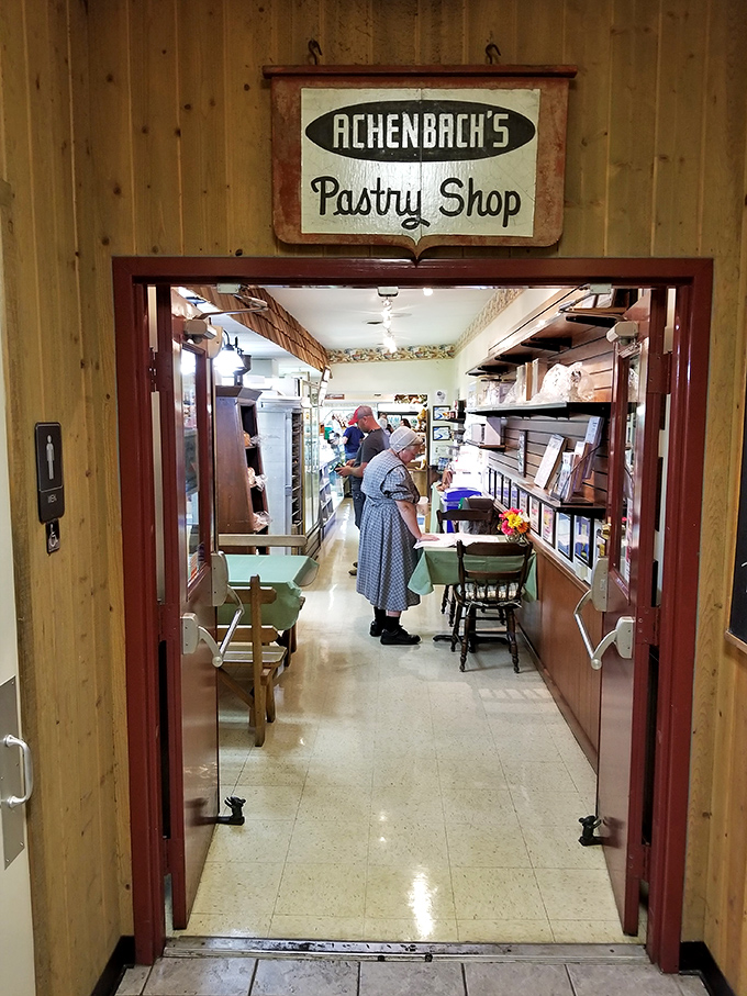 Through these doors lies pastry paradise. The Amish woman in traditional dress adds authentic Pennsylvania Dutch charm to this sweet sanctuary.