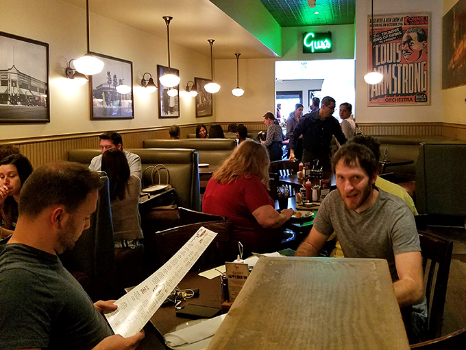 Where strangers become friends over shared BBQ enthusiasm. That menu-studying concentration is something we can all relate to.