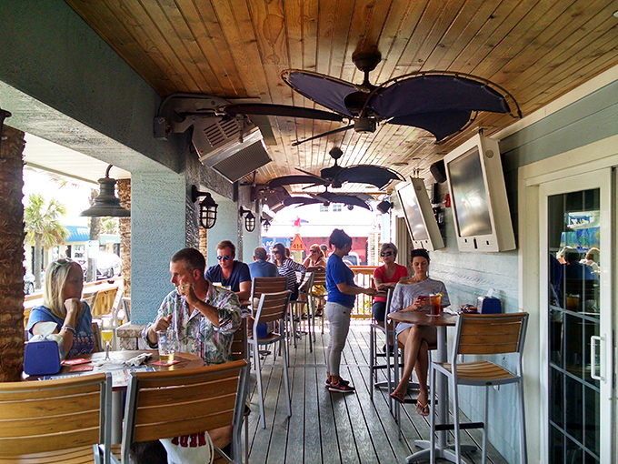 The outdoor deck&mdash;where vacation vibes are mandatory and strangers become friends over shared recommendations and ocean breezes.