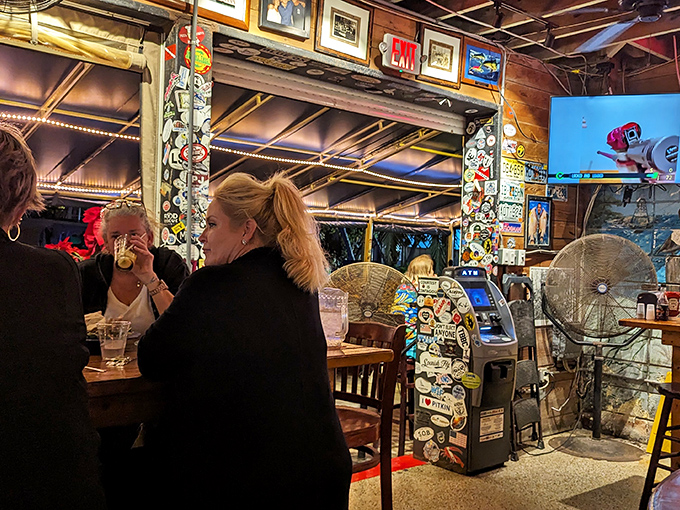 Under that thatched roof, picnic tables aren't just furniture &ndash; they're community builders where strangers become friends over conch fritters.