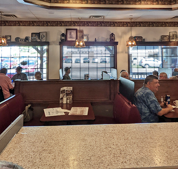 Regulars settle into their favorite booths, where the newspaper might be as essential to the experience as the coffee.