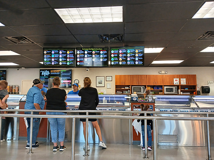 Digital menu boards display a kaleidoscope of flavors, each one a potential life-changing experience waiting to happen.