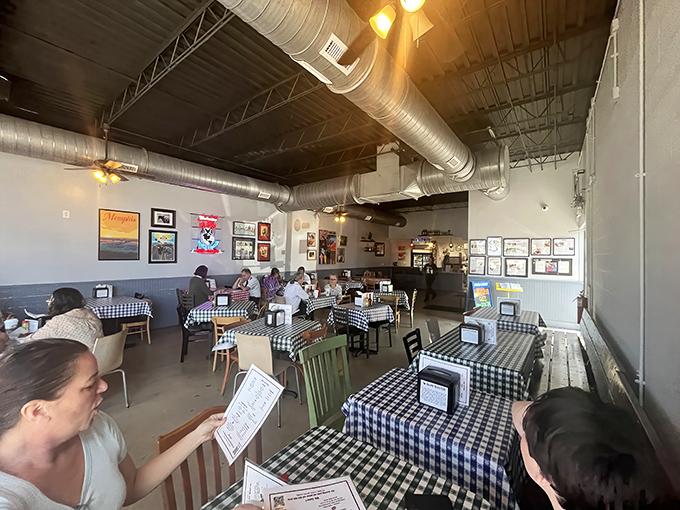 Every table tells a story at Gus's. The dining room hums with the universal language of "mmm" and "oh my goodness."