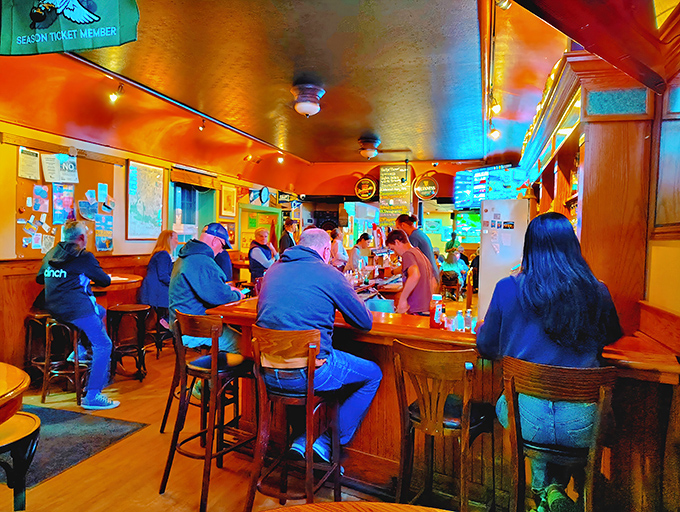 The bar buzzes with energy as regulars and newcomers alike share the universal language of good food and better company.