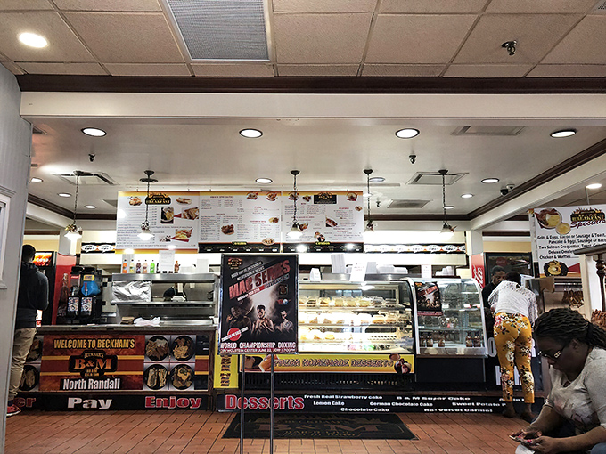 The counter area showcases desserts that somehow find room in stomachs already stretched to capacity by barbecue excellence.