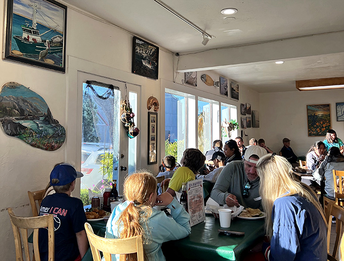 Happy diners proving that good food is the universal language&mdash;no translation needed, just appetite.