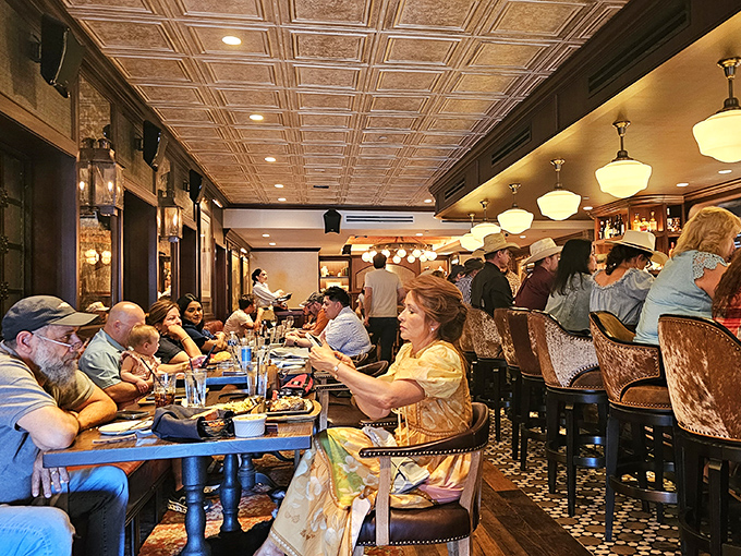 The dining room hums with the universal language of "mmm" as patrons engage in the serious business of steak appreciation.
