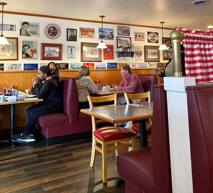 Red vinyl booths and license plates create the backdrop for El Cajon's morning rituals. Every table has heard decades of laughter and local gossip. 