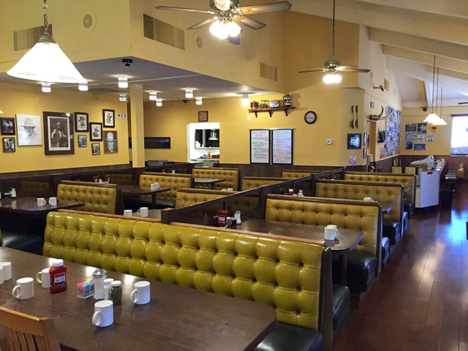The dining area's mustard-yellow booths invite you to slide in, settle down, and prepare for comfort food that hugs your soul.