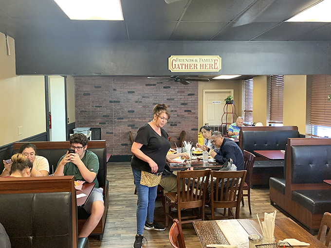 That "Friends & Family Gather Here" sign isn't just decoration&mdash;it's the most honest advertising you'll find in the restaurant business.