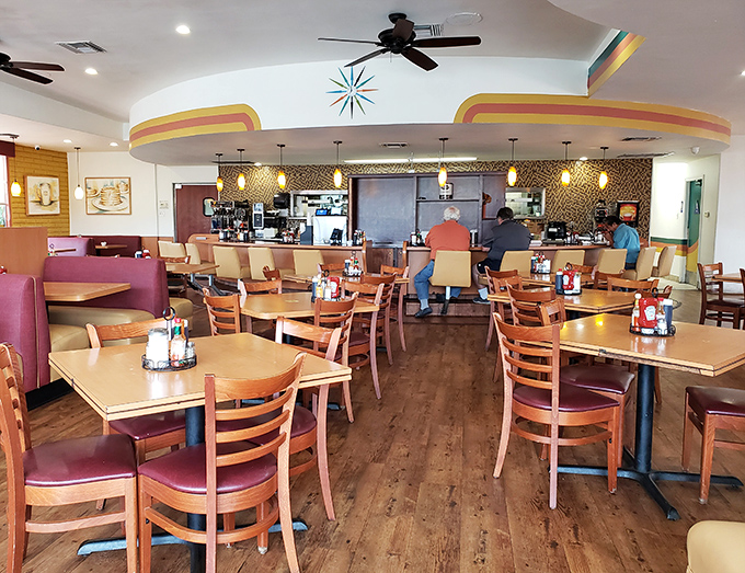 The dining room where breakfast memories are made. Warm lighting, comfortable seating, and the promise of pancakes create the perfect morning sanctuary. 