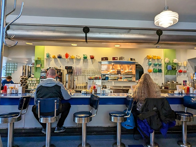 The counter seats: where solo diners become regulars and the coffee keeps flowing until your problems seem smaller.